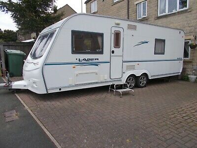 Coachman Laser 640/4 Fixed Bed Twin Axle Caravan With Motor Mover And ...
